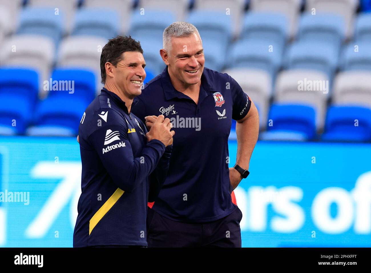 Assistant coach of the Eels Trent Barrett speaks to assistant coach of ...