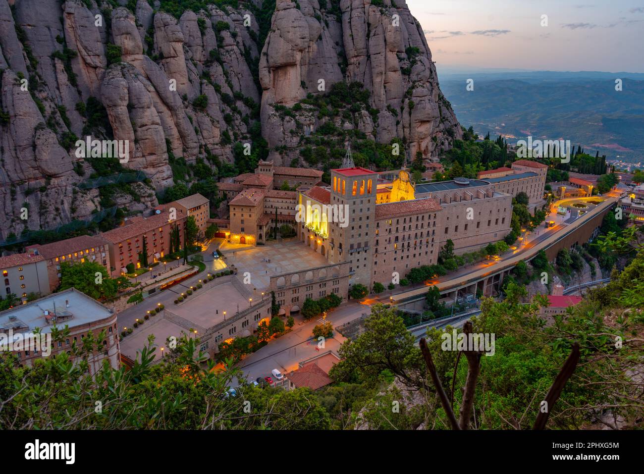 Sunset panorama view of Santa Maria de Montserrat abbey in Spain Stock ...