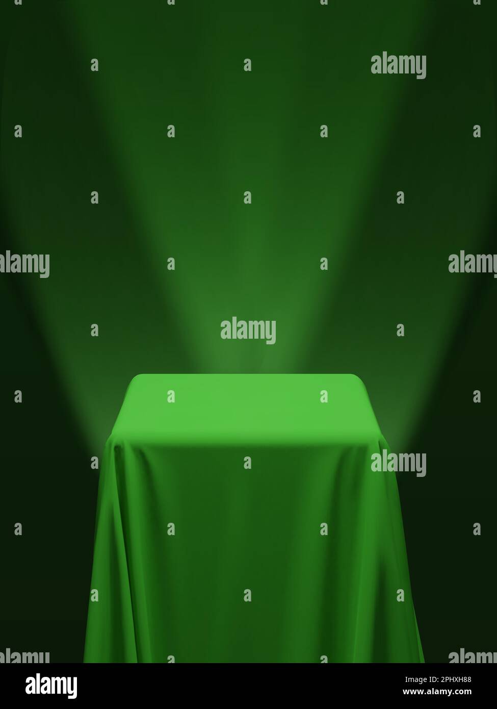 Green fabric covering a cube or a table, with green background and ...