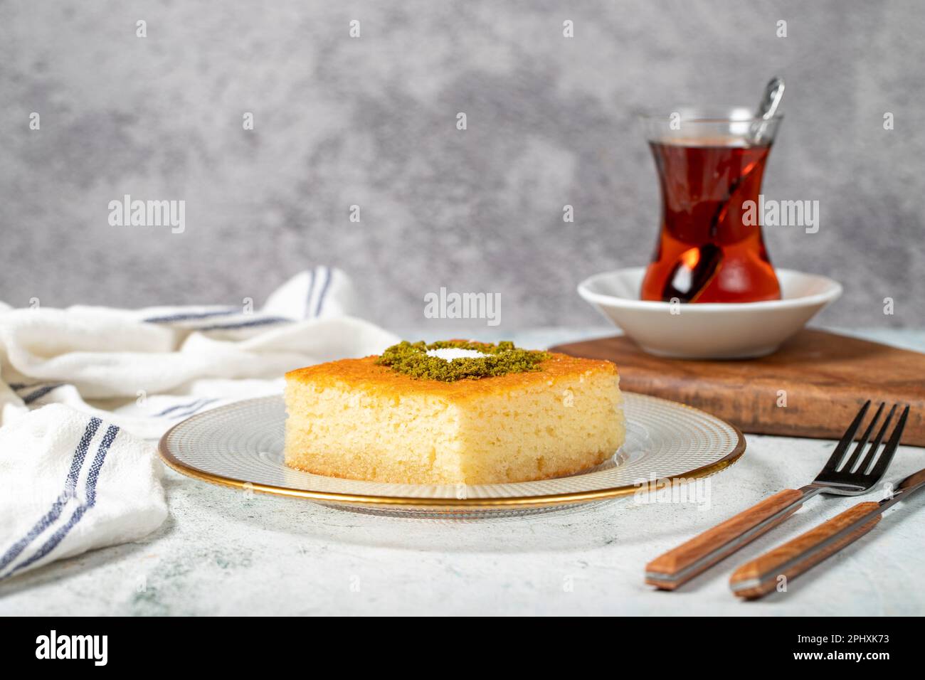 Revani dessert. Sweet semolina cake with pistachio. Ramadan sweets ...