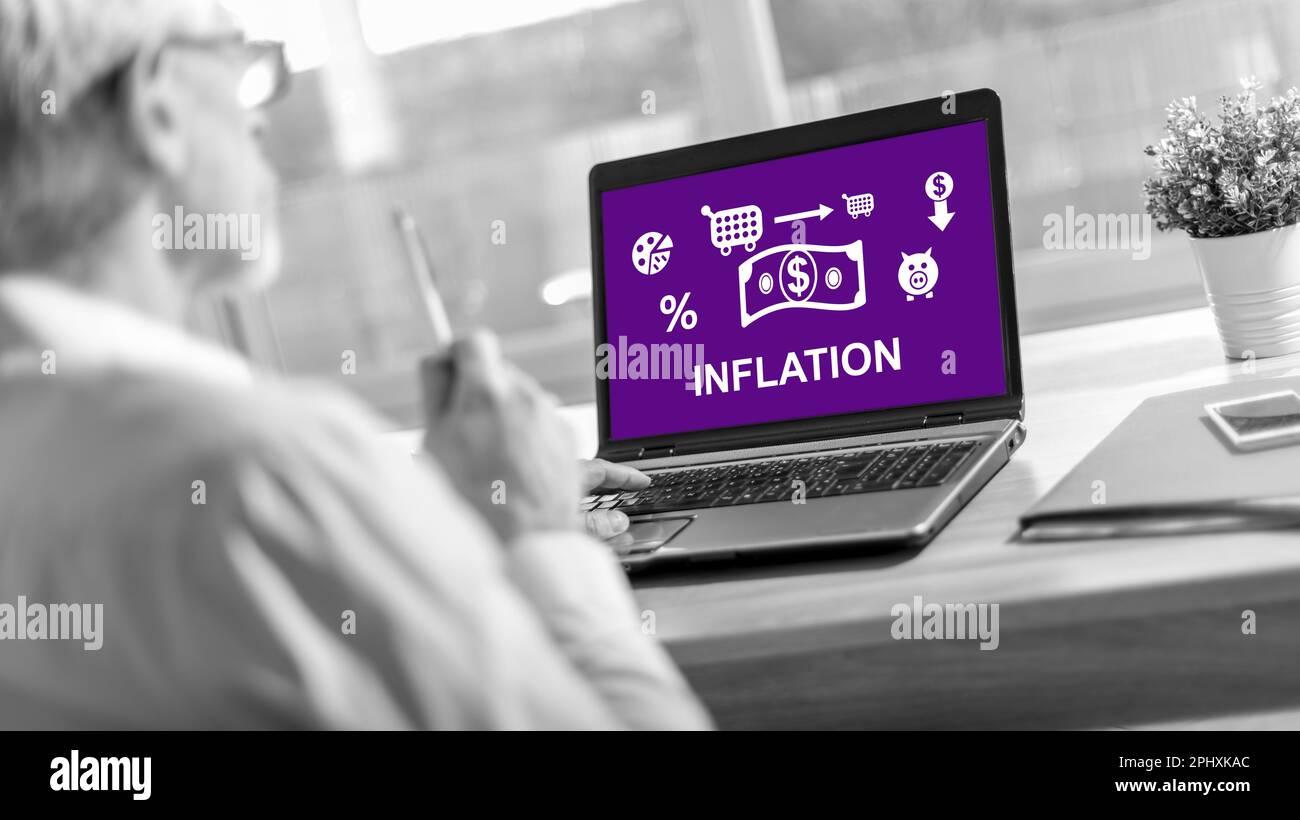 Laptop screen displaying an inflation concept Stock Photo - Alamy