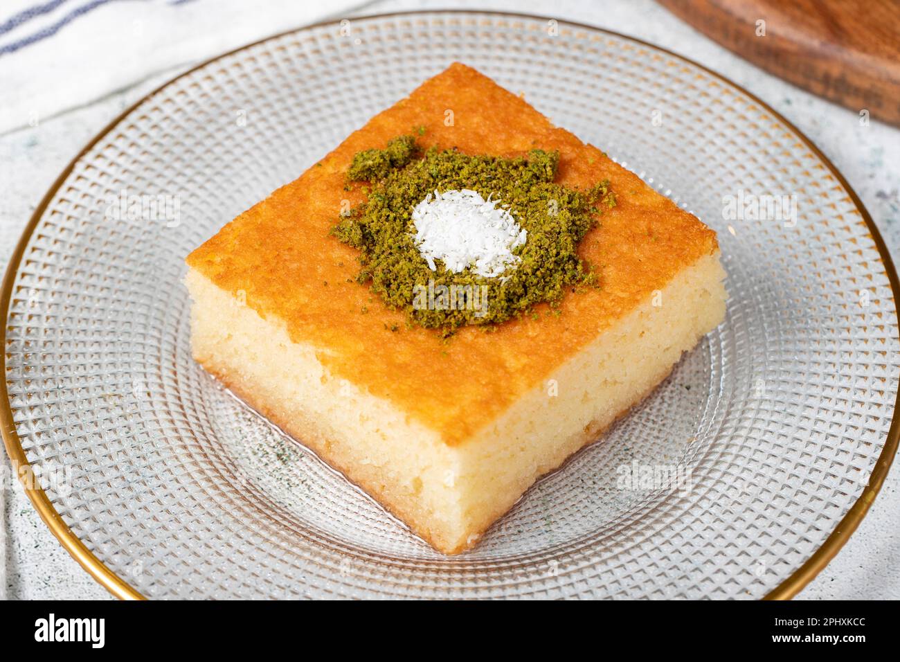 Revani dessert. Sweet semolina cake with pistachio. Ramadan sweets ...