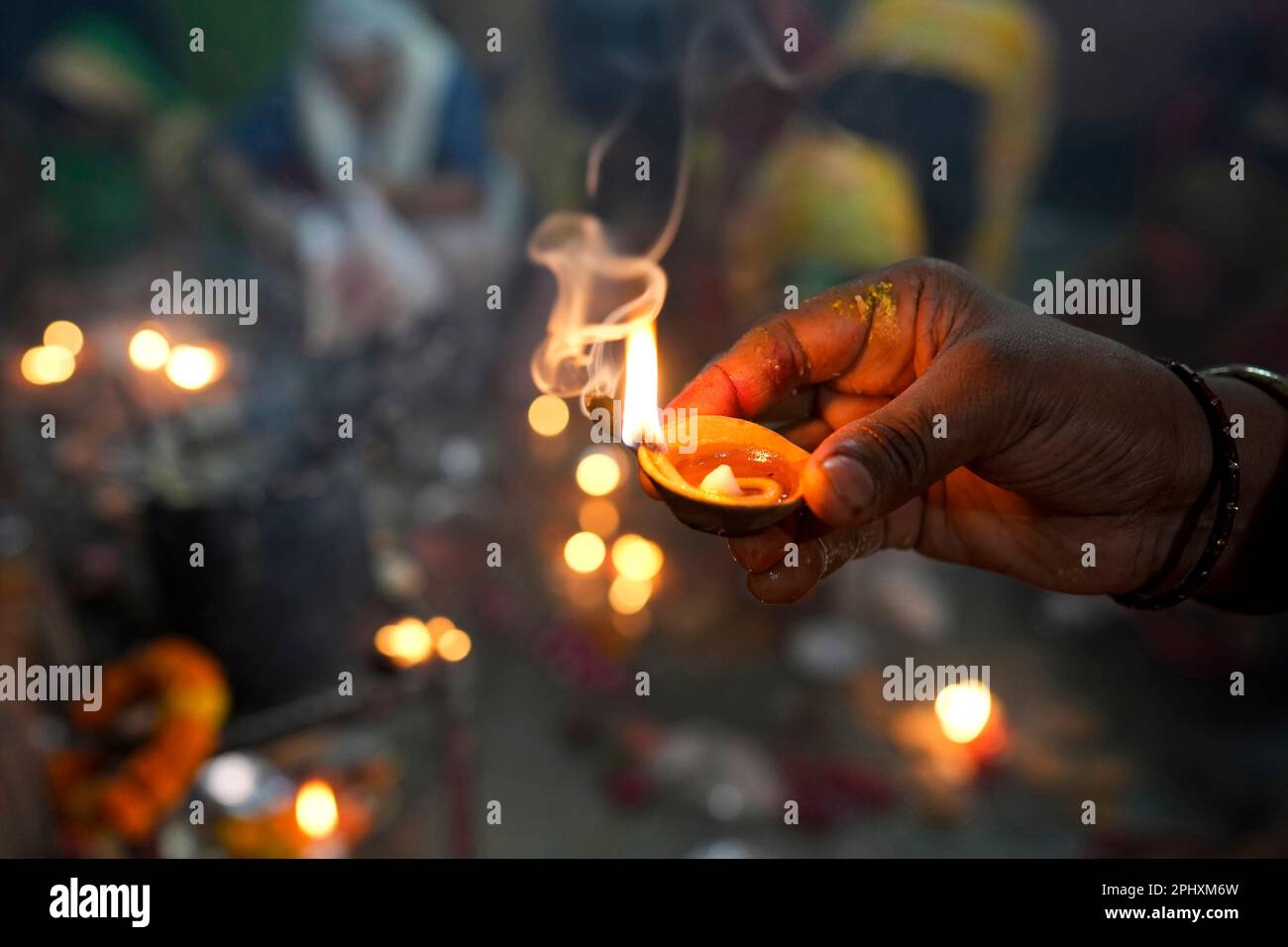 Indian Hindu devotees offer prayers inside the Alopi Devi temple on the ...