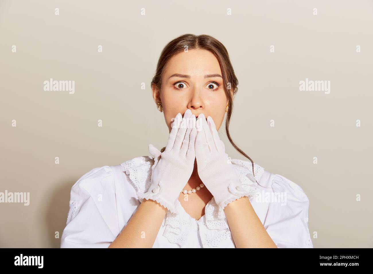 Close up portrait of adorable woman wearing white gloves and closed ...