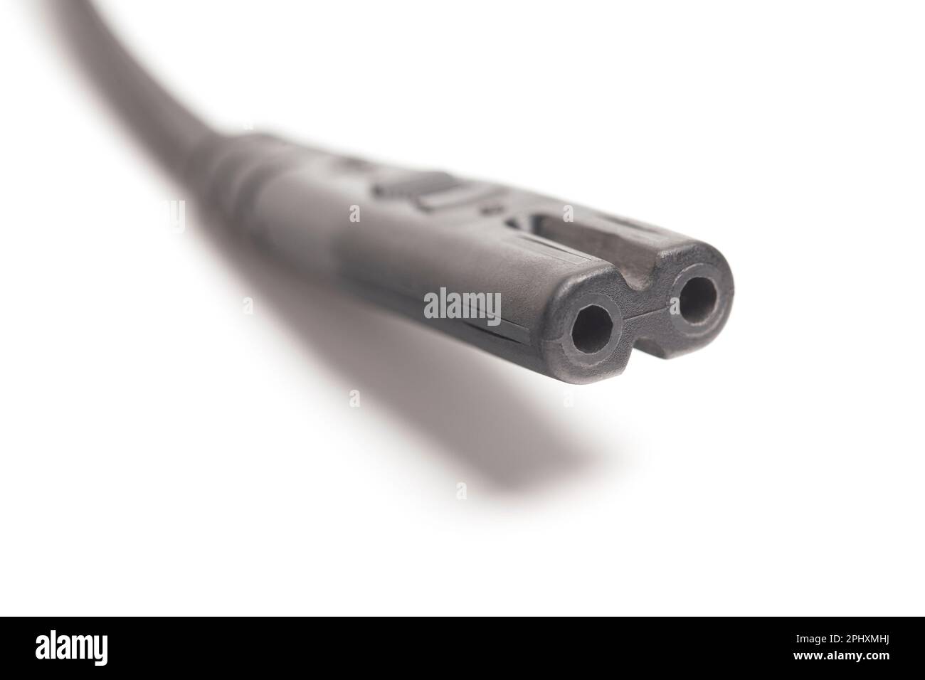 Black cable power supply isolated on white background Stock Photo - Alamy