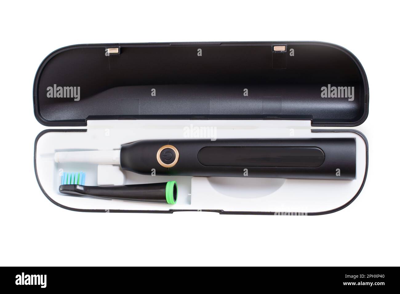 Close-up view of a black electric toothbrush with a detachable brush ...