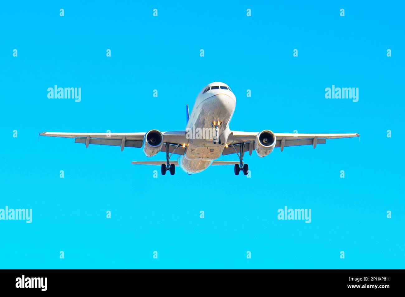 Plane descending for landing, with the viewer positioned directly below ...