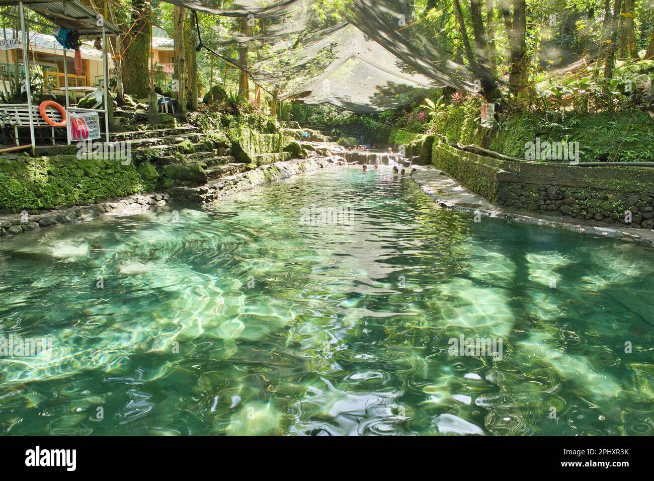 The idyllic Ardent Hot Springs in Camiguin, Philippines, surrounded by ...