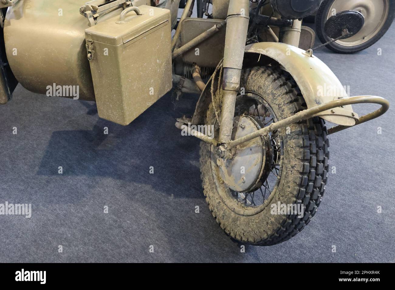 Wheel of an old motorcycle in the mud Stock Photo - Alamy