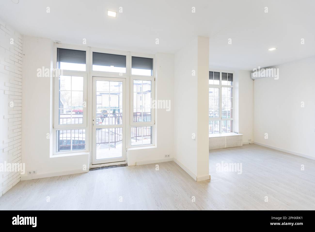 Modern empty elegant office with windows and workplaces Stock Photo - Alamy