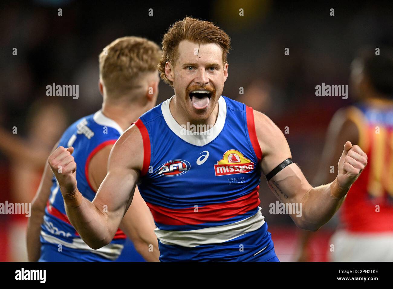 Oskar Baker of the Bulldogs celebrates kicking a goal during the AFL ...