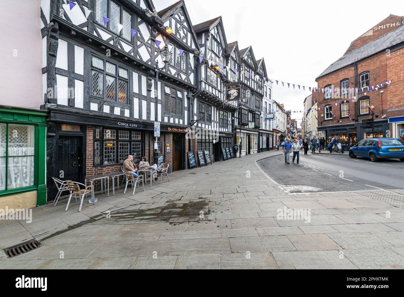 Old Tudor Buildings housing Ye Olde Bull King Tavern and the Oxfam Shop ...