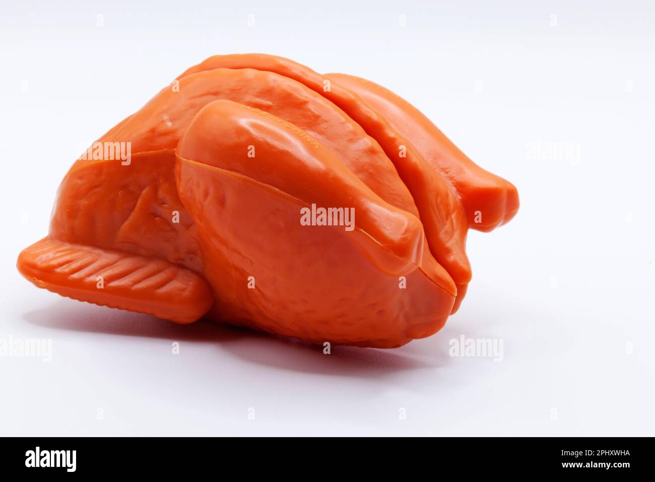 plastic toy whole chicken on white background Stock Photo - Alamy