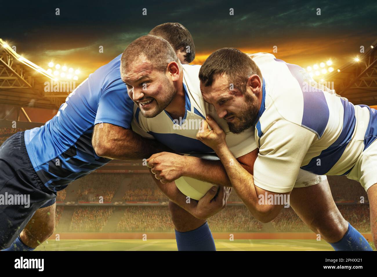 Tense moment. Three men, professional rugby player in motions ...