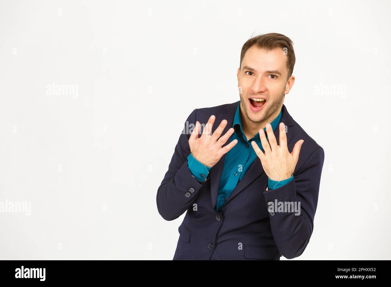 Portrait of a smiling young business man white background Stock Photo ...