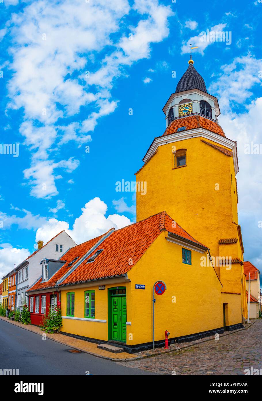 Yellow clock tower in Faaborg, Denmark Stock Photo - Alamy