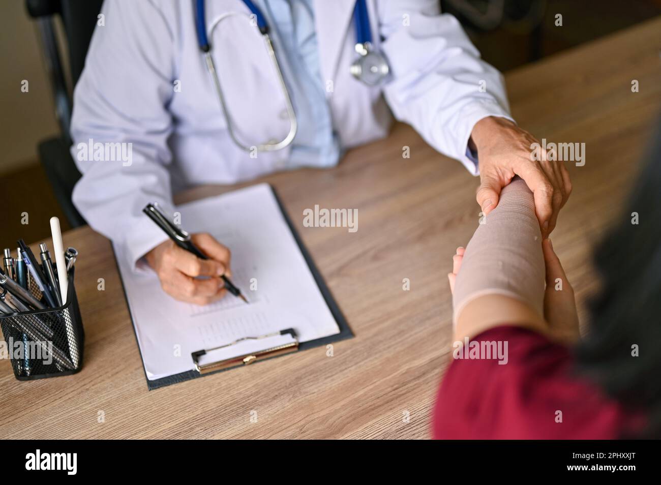 Close-up image of a professional orthopedic doctor doing a physical ...