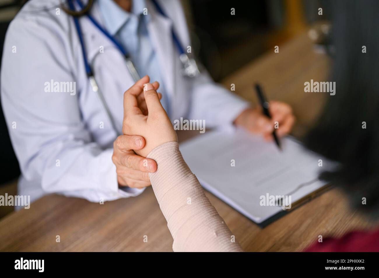 Close-up image of a professional orthopedic doctor doing a physical ...