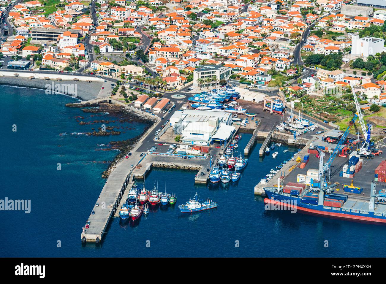 Aerial view of a bustling port, featuring ships and infrastructure in ...