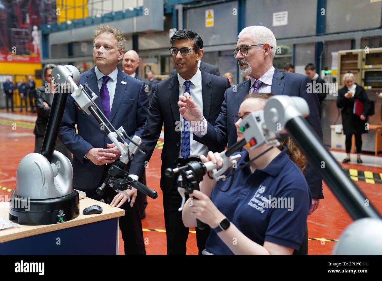 Prime Minister Rishi Sunak (centre) and Grant Shapps, Secretary of State for Energy Security and ...
