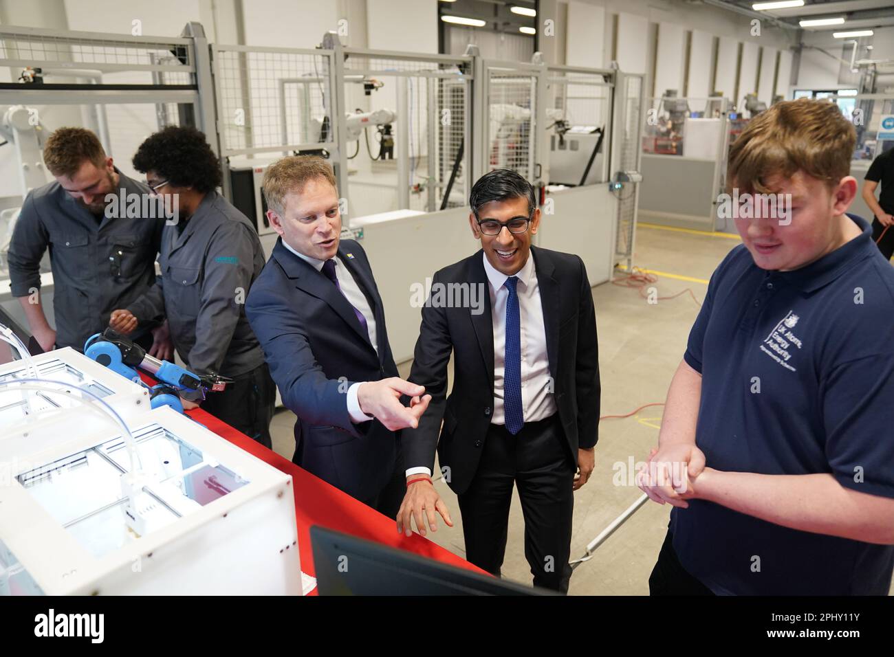 Prime Minister Rishi Sunak (centre) and Grant Shapps, Secretary of ...