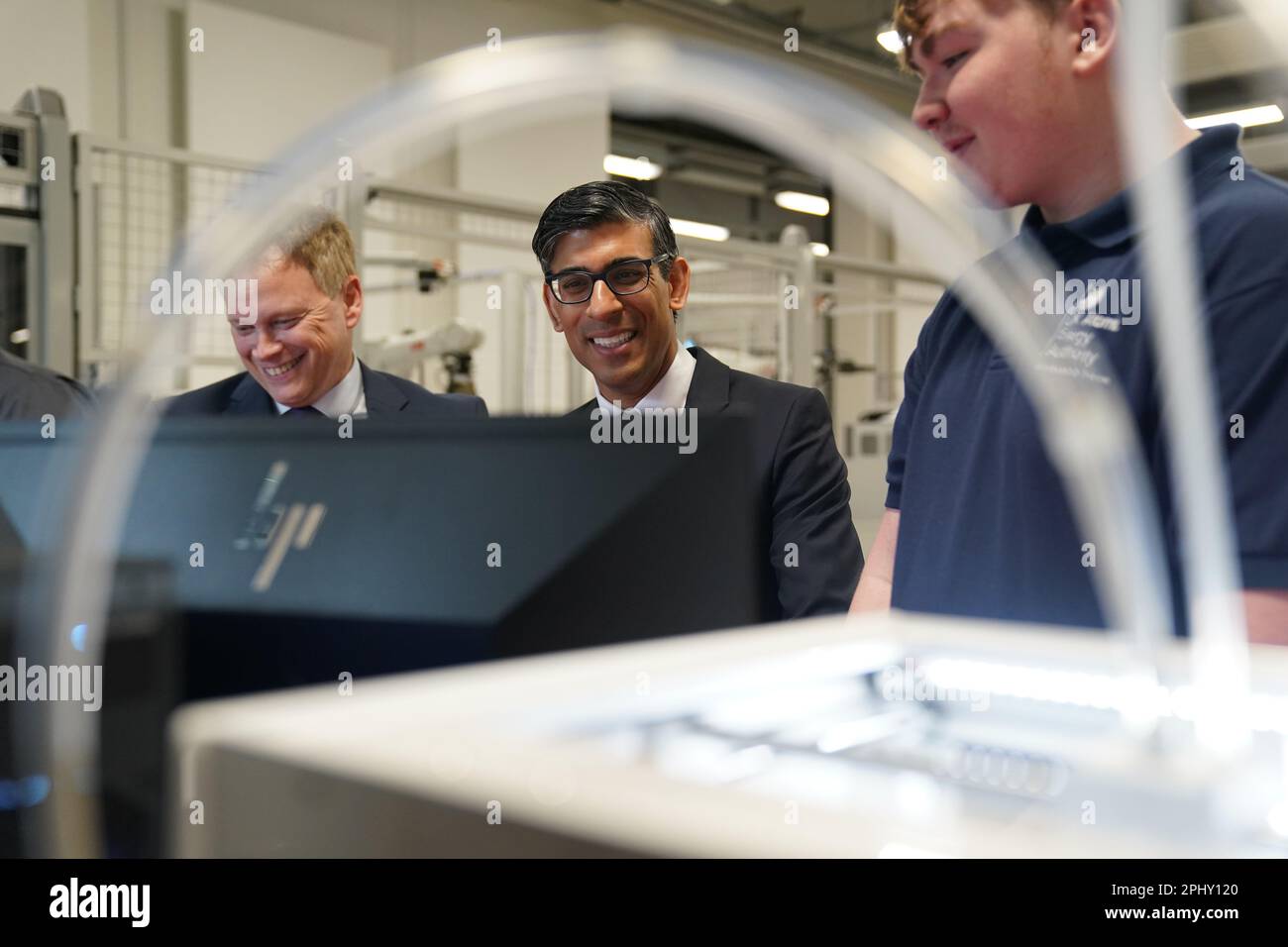 Prime Minister Rishi Sunak (centre) and Grant Shapps, Secretary of State for Energy Security and ...
