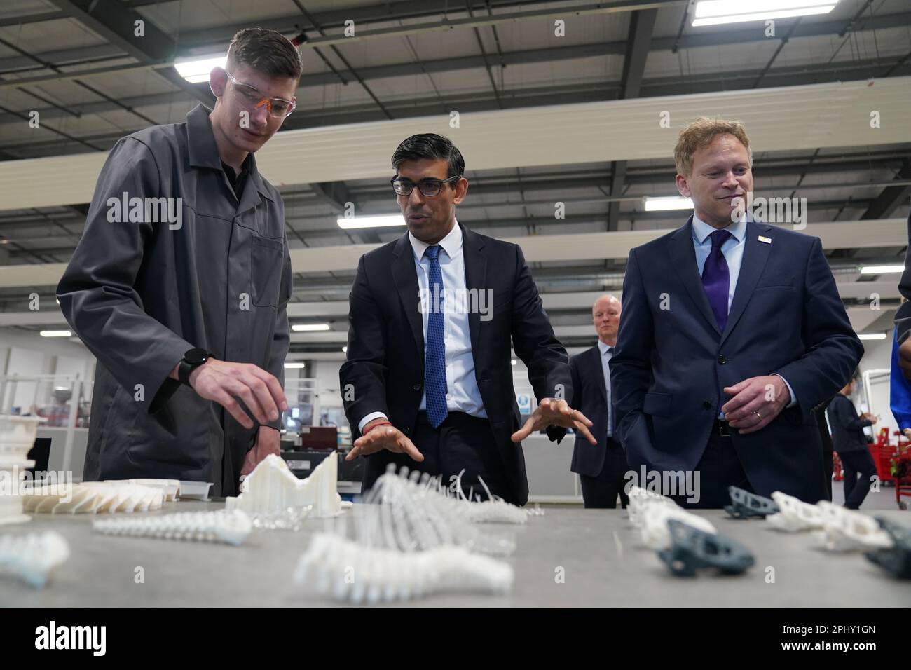 Prime Minister Rishi Sunak (centre) and Grant Shapps, Secretary of State for Energy Security and ...