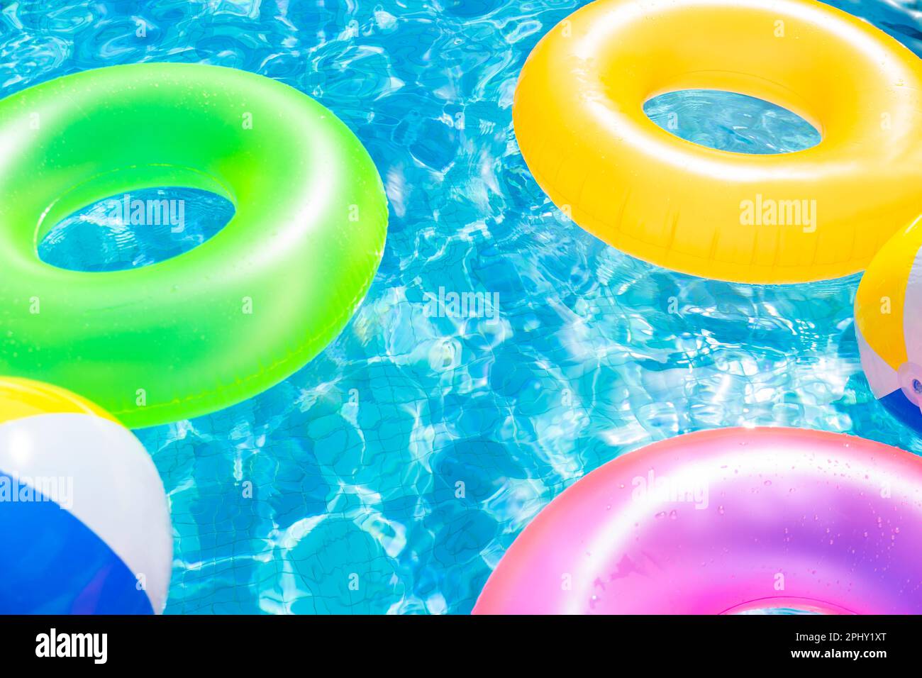 Inflatable Swimming Ring floating in the pool Stock Photo - Alamy