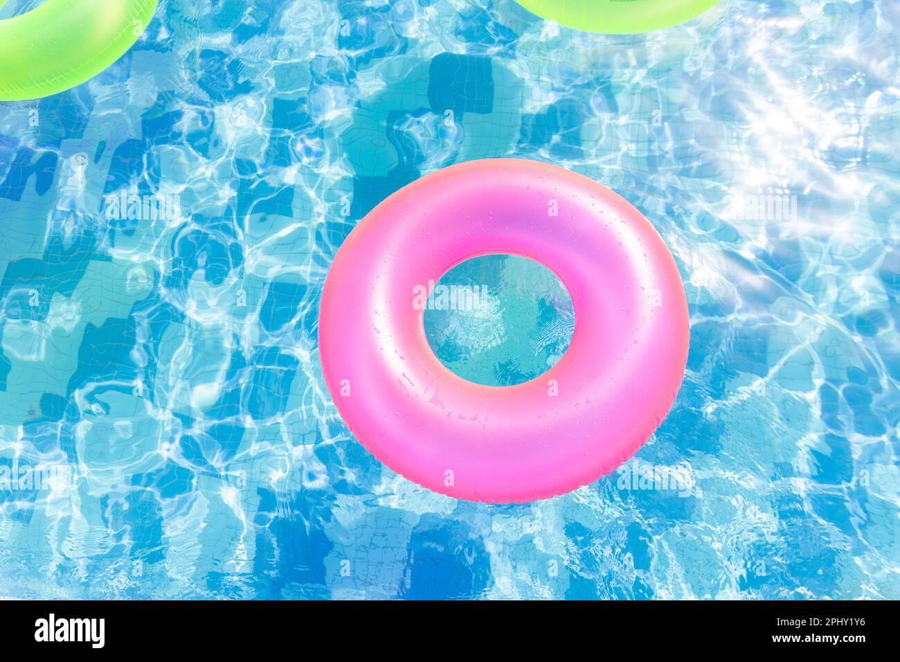 Inflatable Swimming Ring floating in the pool Stock Photo - Alamy