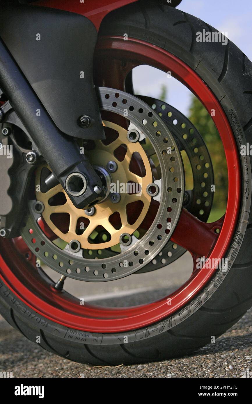 Front wheel of a motorbike with disc brake Stock Photo - Alamy