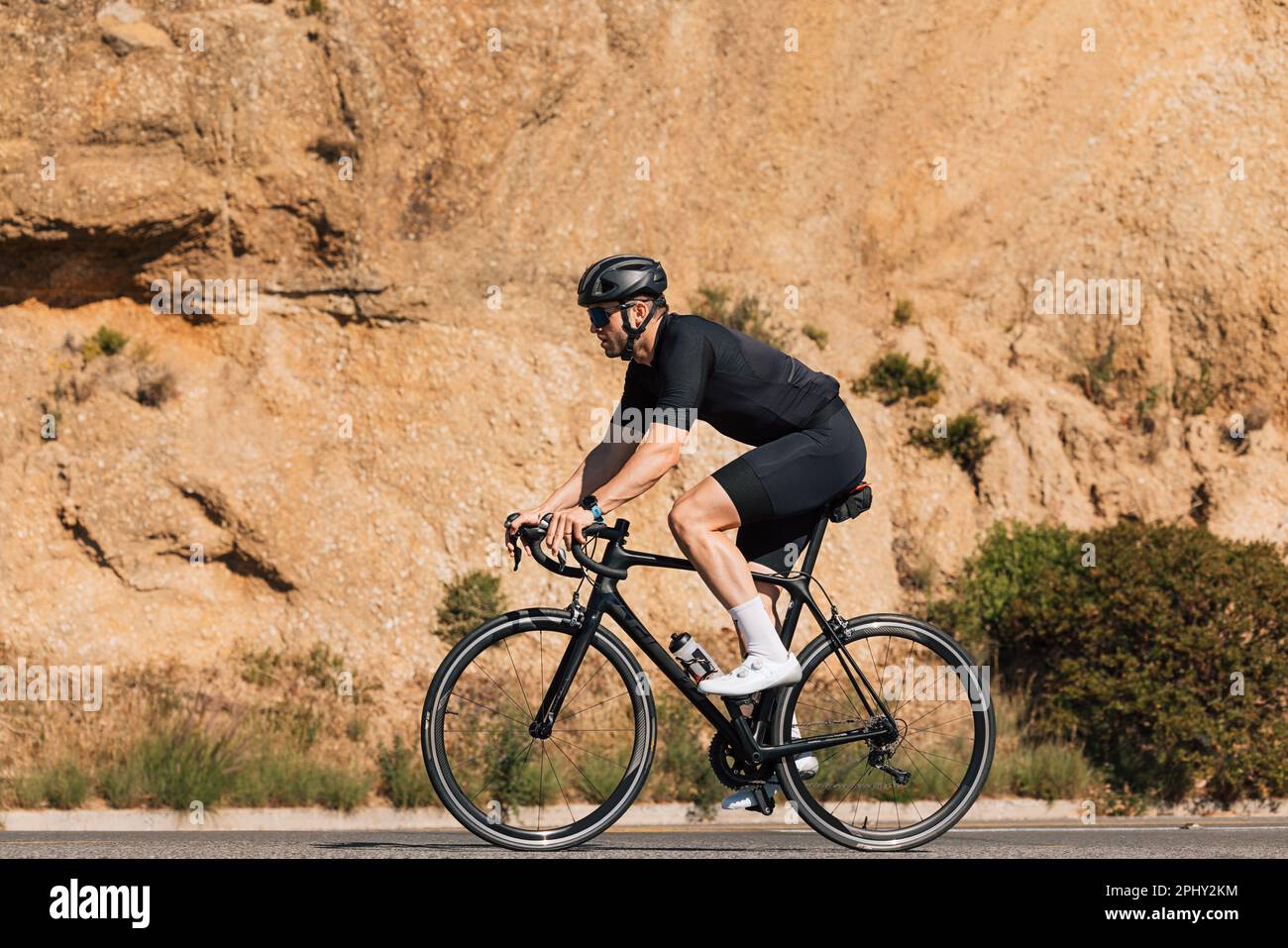 Riding a bicycle side view hi-res stock photography and images - Alamy