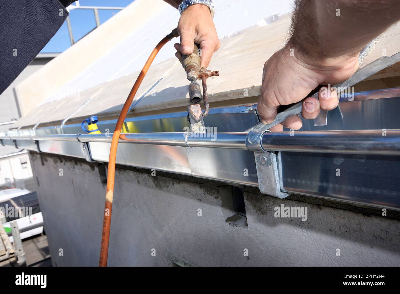 gutter connections are soldered Stock Photo - Alamy