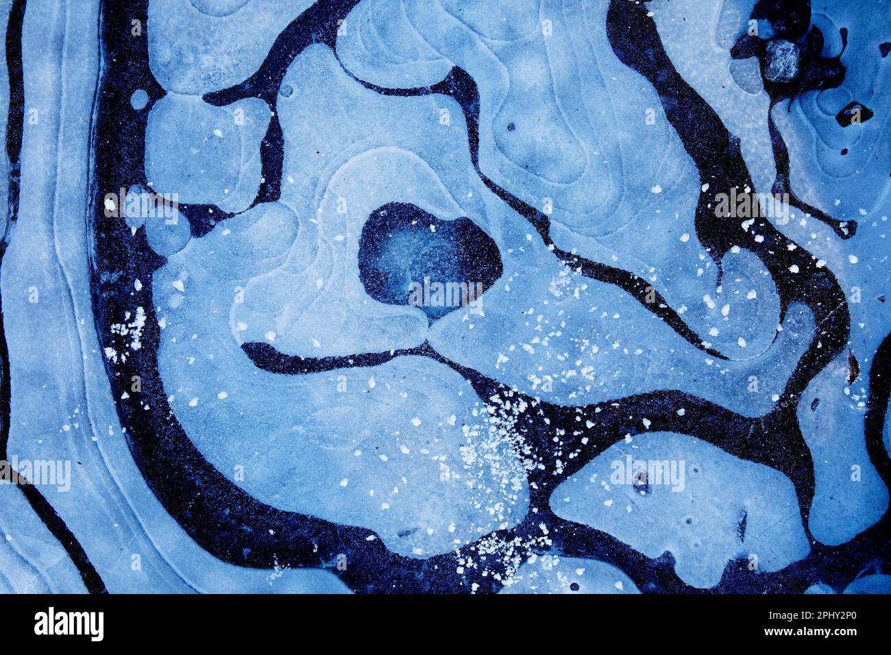 frozen puddle with air inclusions, Germany Stock Photo - Alamy