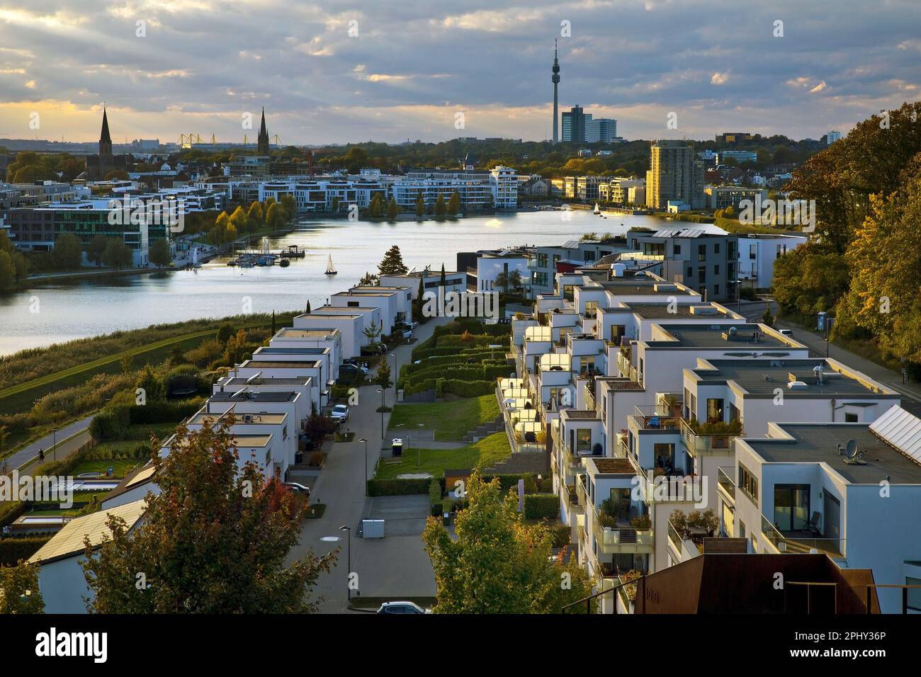 Residential development at Lake Phoenix with the city skyline in the ...