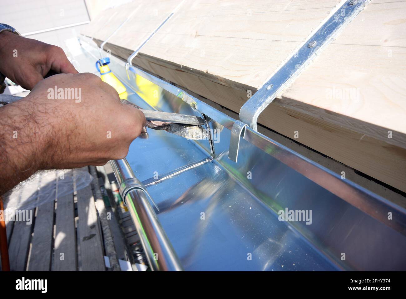 gutter connections are soldered Stock Photo - Alamy