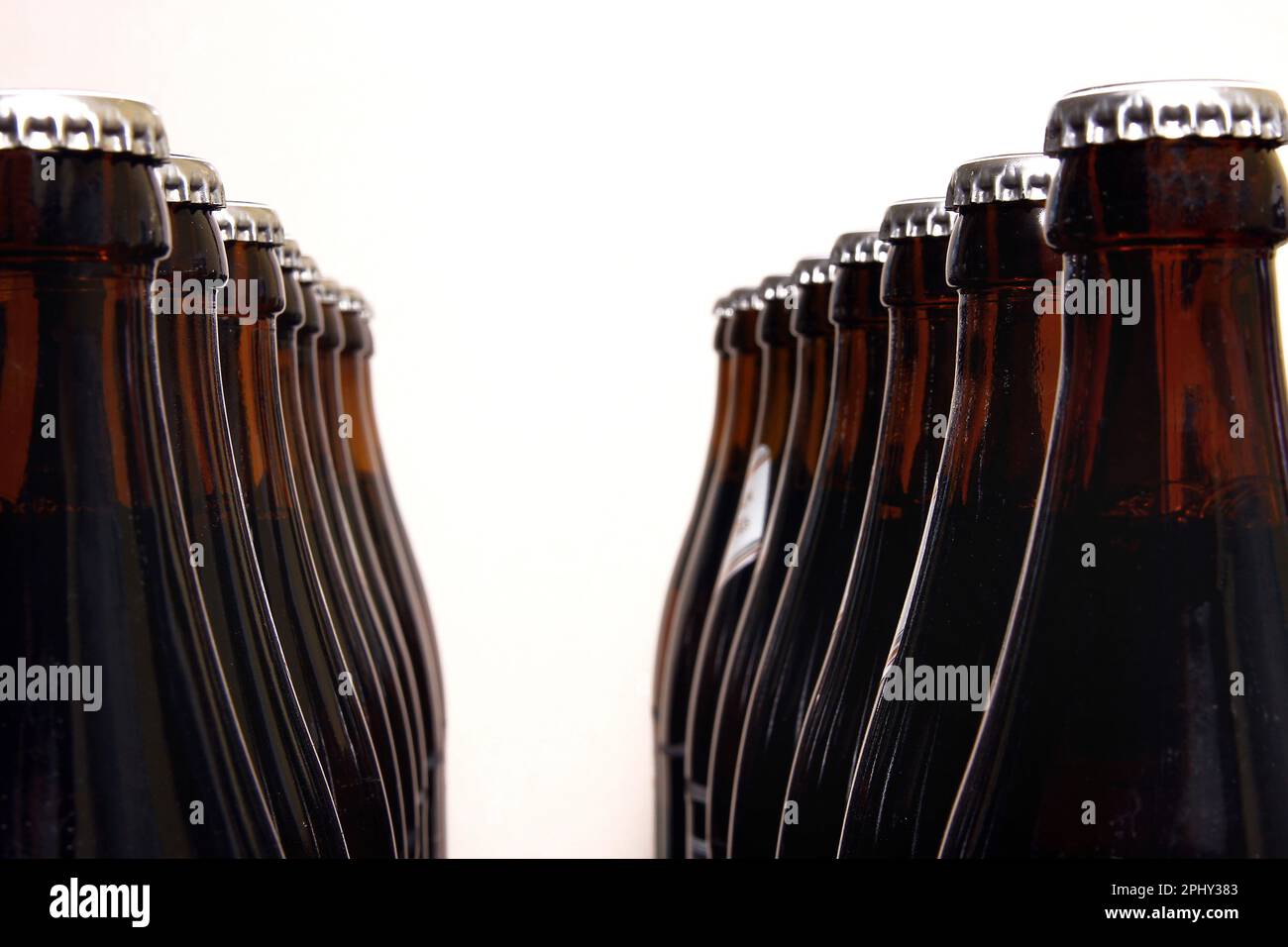 beer bottles with bottle caps in rows, cutout Stock Photo - Alamy