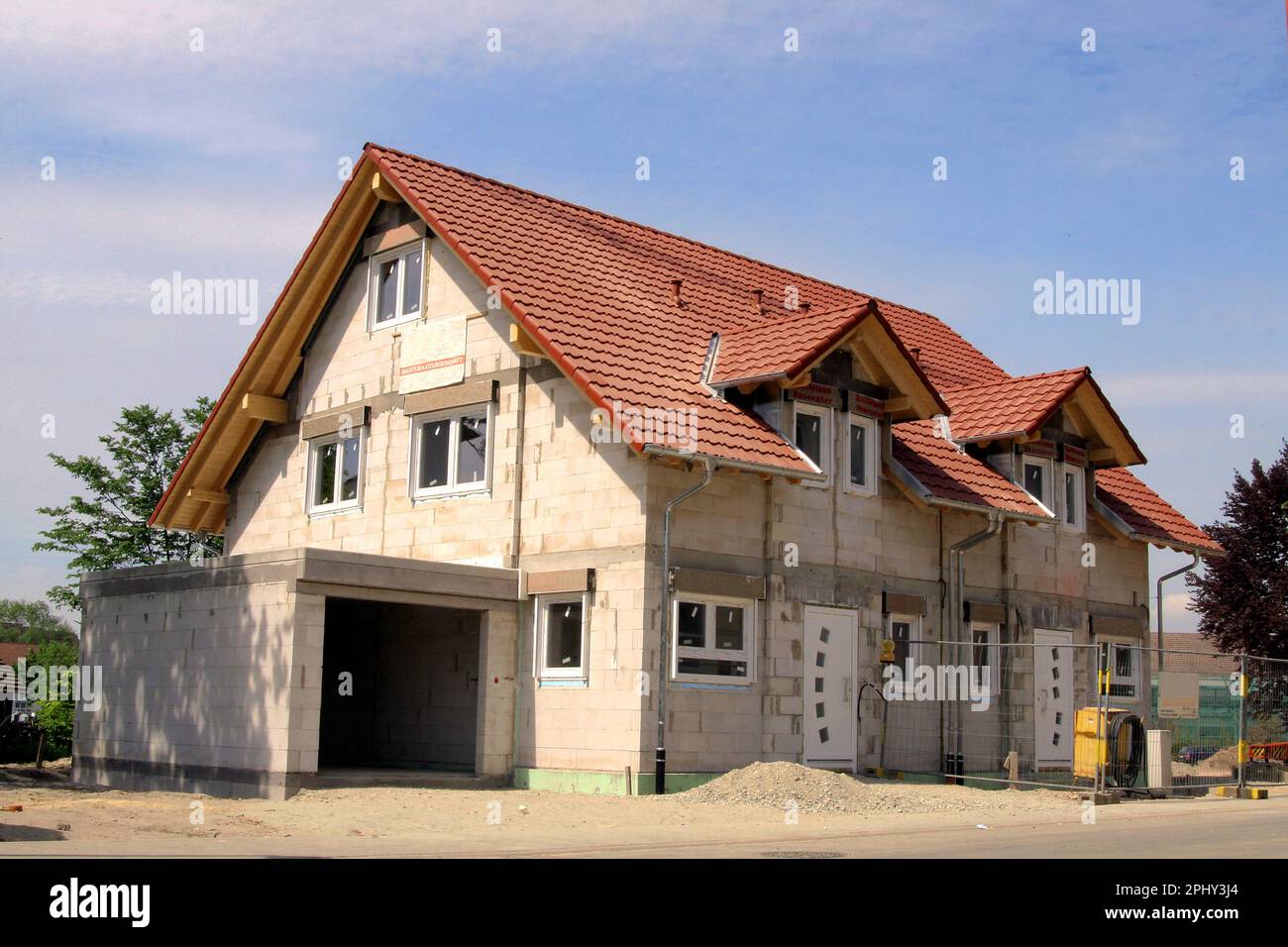 newly built house and almost finished house Stock Photo - Alamy