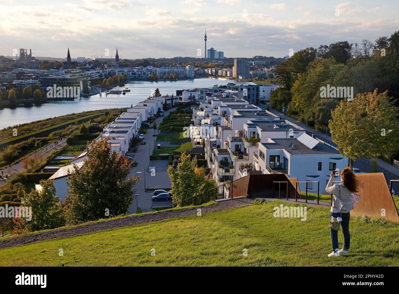Residential development at Lake Phoenix with the city skyline in the ...