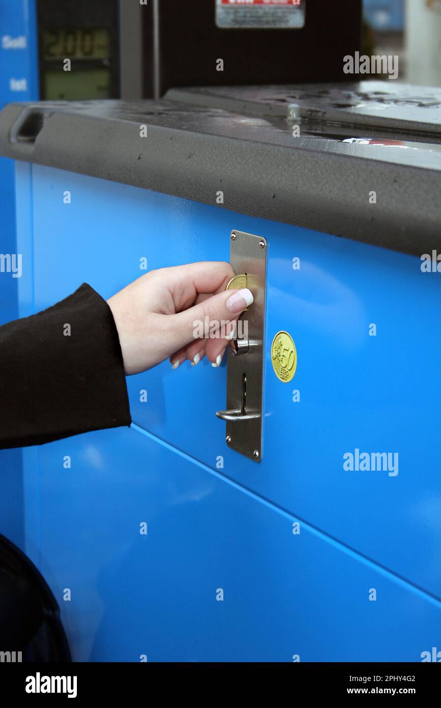 coin slot on a car hoover Stock Photo - Alamy