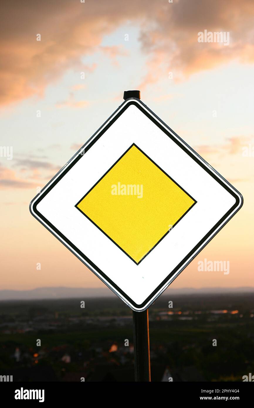 give way sign at sunset, Germany Stock Photo - Alamy