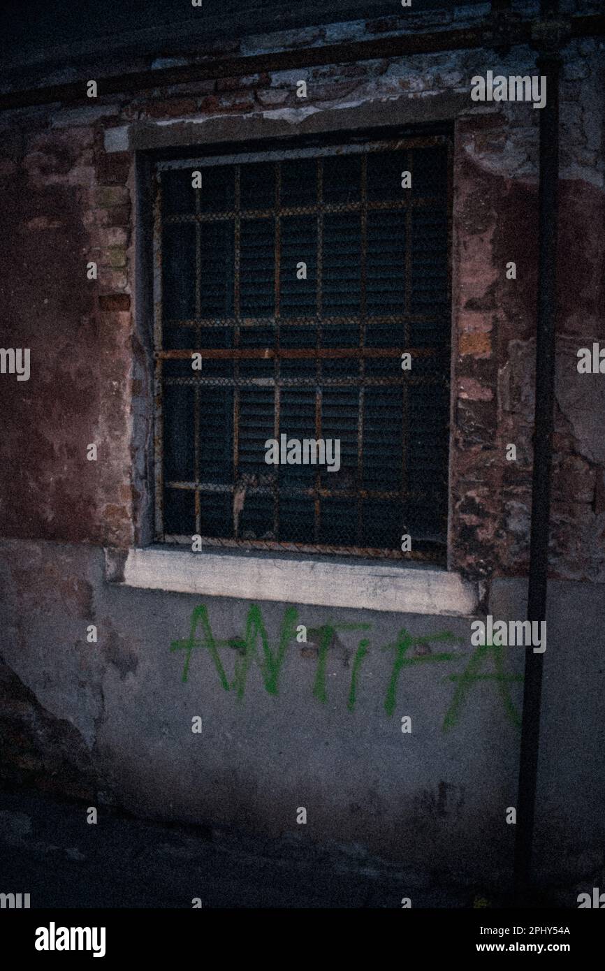 Antifa graffiti underneath window in venice Stock Photo - Alamy