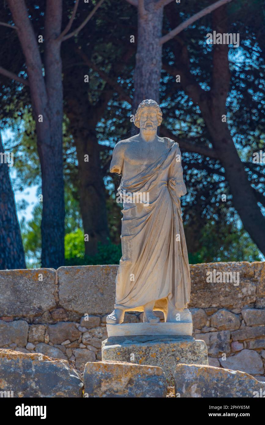 Statue at roman ruins of ancient site Empuries in Catalunya, Spain ...