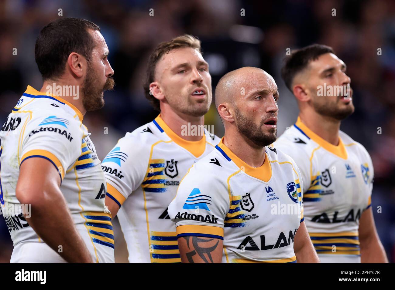 Eels players look on during a Roosters conversion during the NRL Round ...