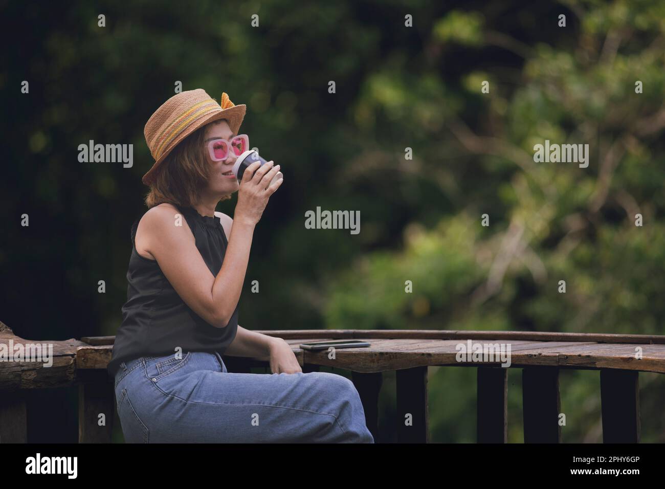beautiful asian woman drinking hot coffee in take a way cup Stock Photo ...