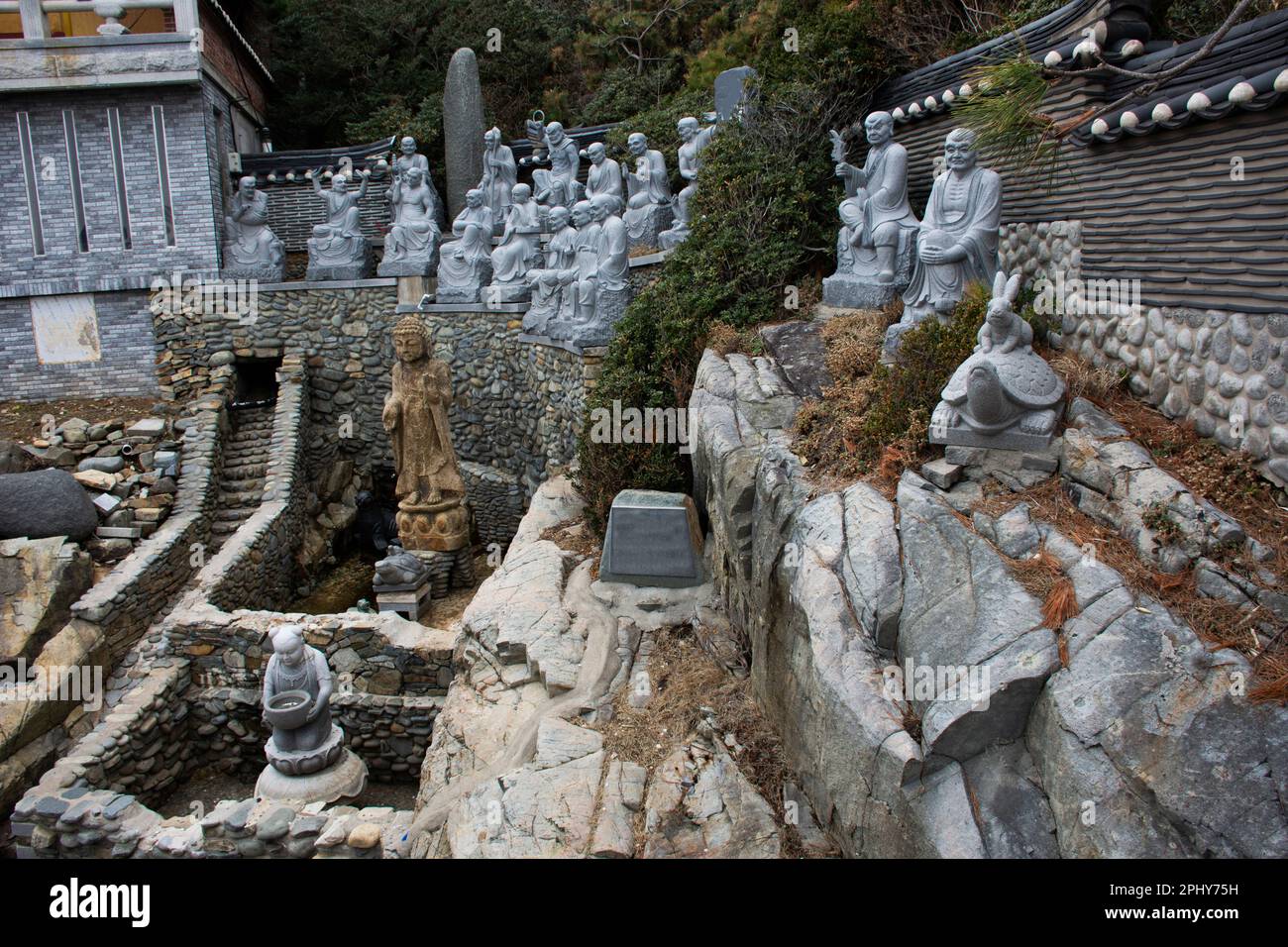 Many buddha and deity angel statue in wishing pond for korean people ...
