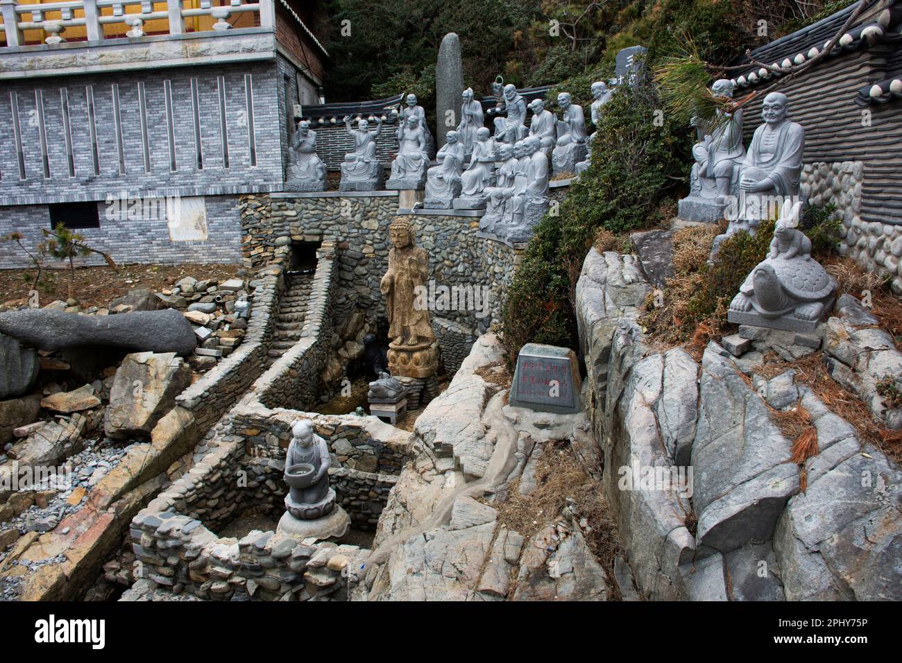 Buddha and deity angel statue in wishing pond for korean people ...