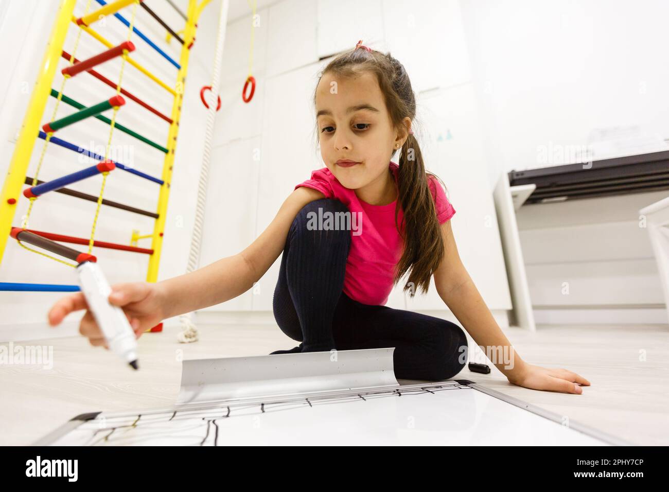 little girl writing on the white board, schooling background Stock ...