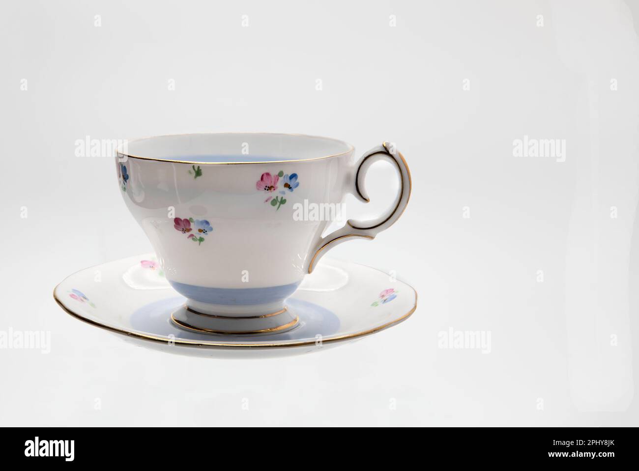 Tea cup isolated on a white background Stock Photo - Alamy