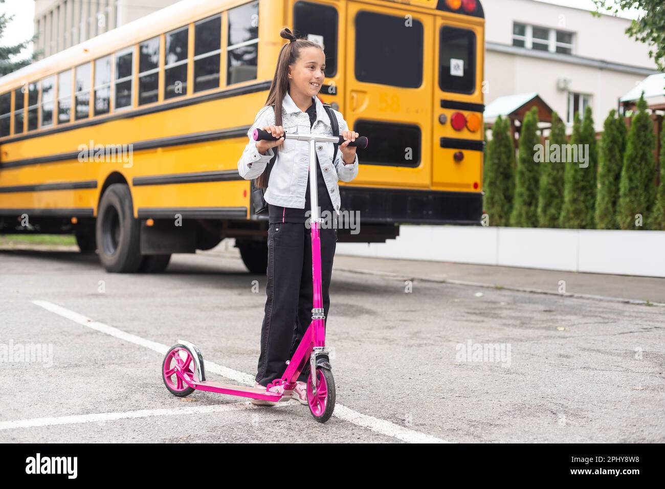 First day of school. Happy child girl elementary school student runs to ...