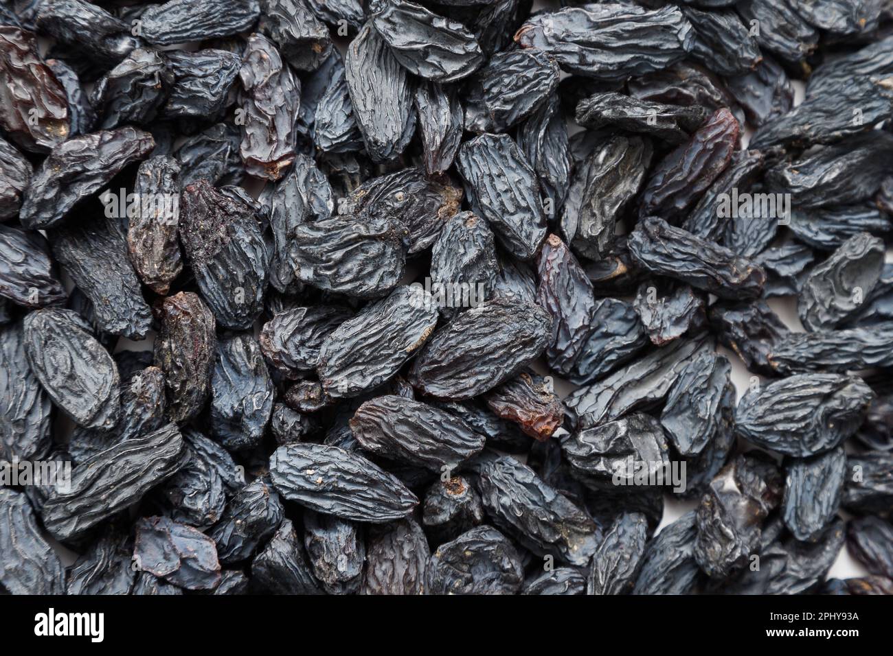 Raisins as background Grape Raisin texture Stock Photo - Alamy